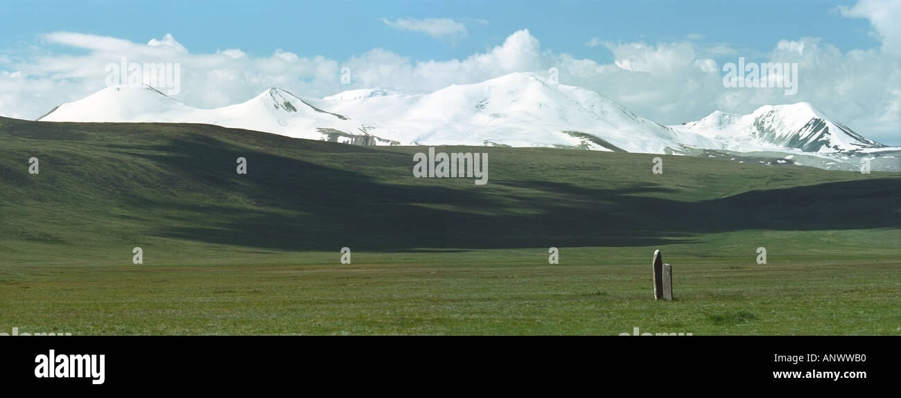 Panorama of the Ukok Plateau with ancient stone figurine with runic ...