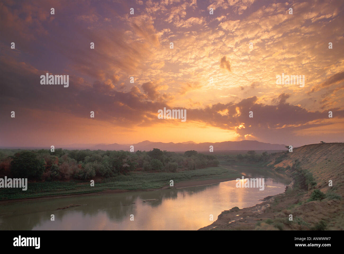 The Omo river flows by a Karo village in the Omo region of Ethiopia ...