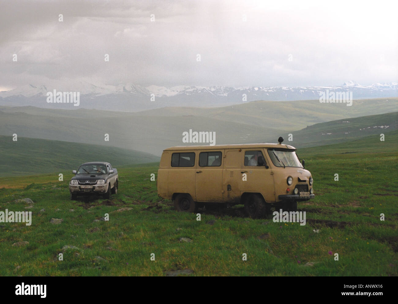 Cross country vehicles of Nissan Safari and UAZ models climbing the ...