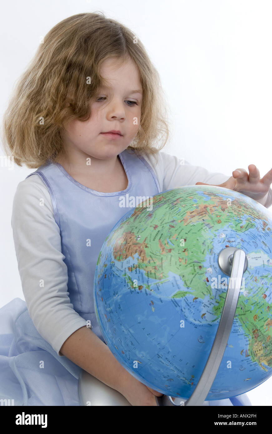 girl exploring globe Stock Photo - Alamy