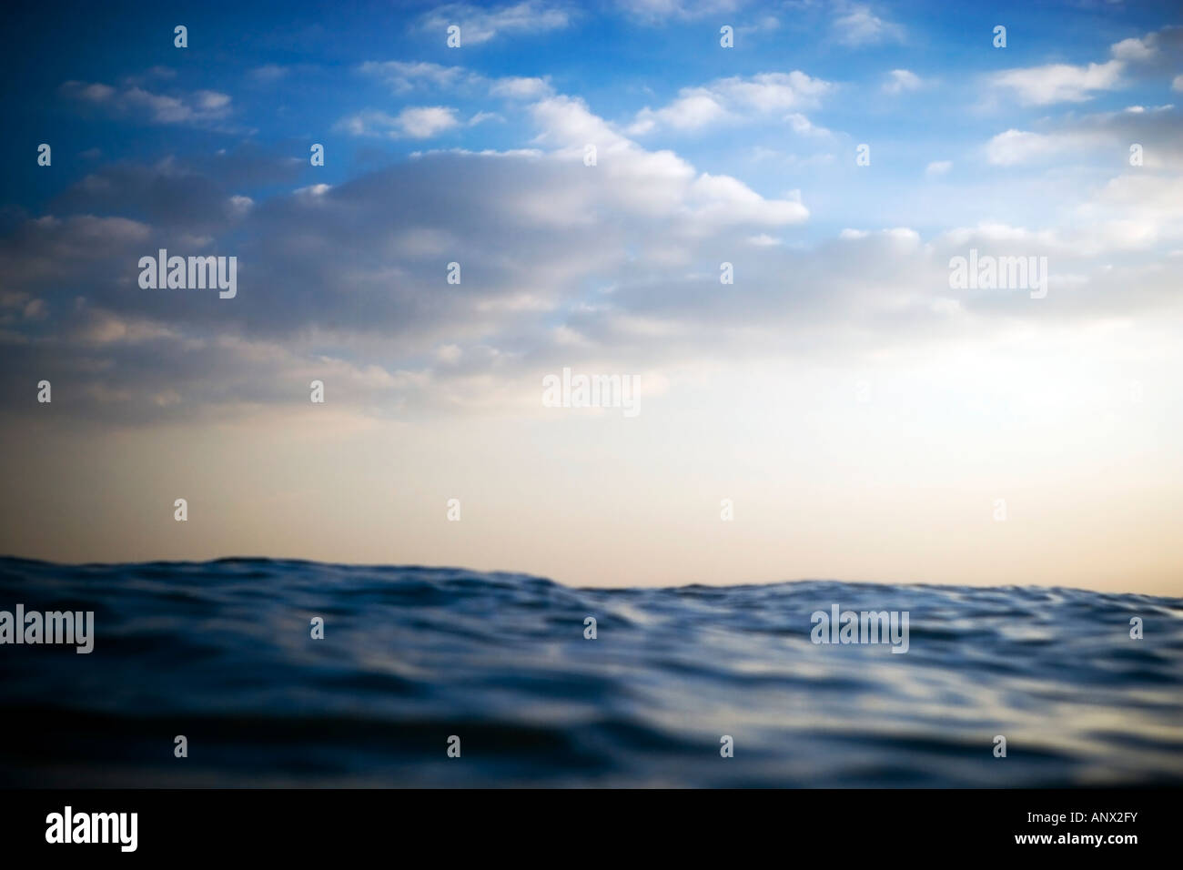 Clouds and sky shot at sea level Stock Photo - Alamy