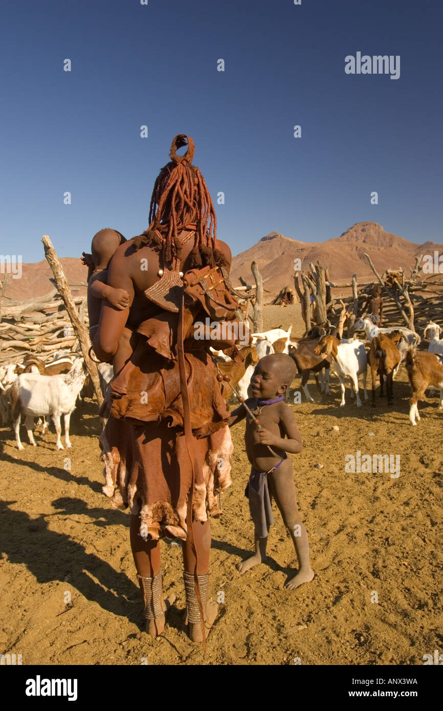 Namibia, Skeleton Coast, Himba Tribe in dailing activities Stock Photo ...