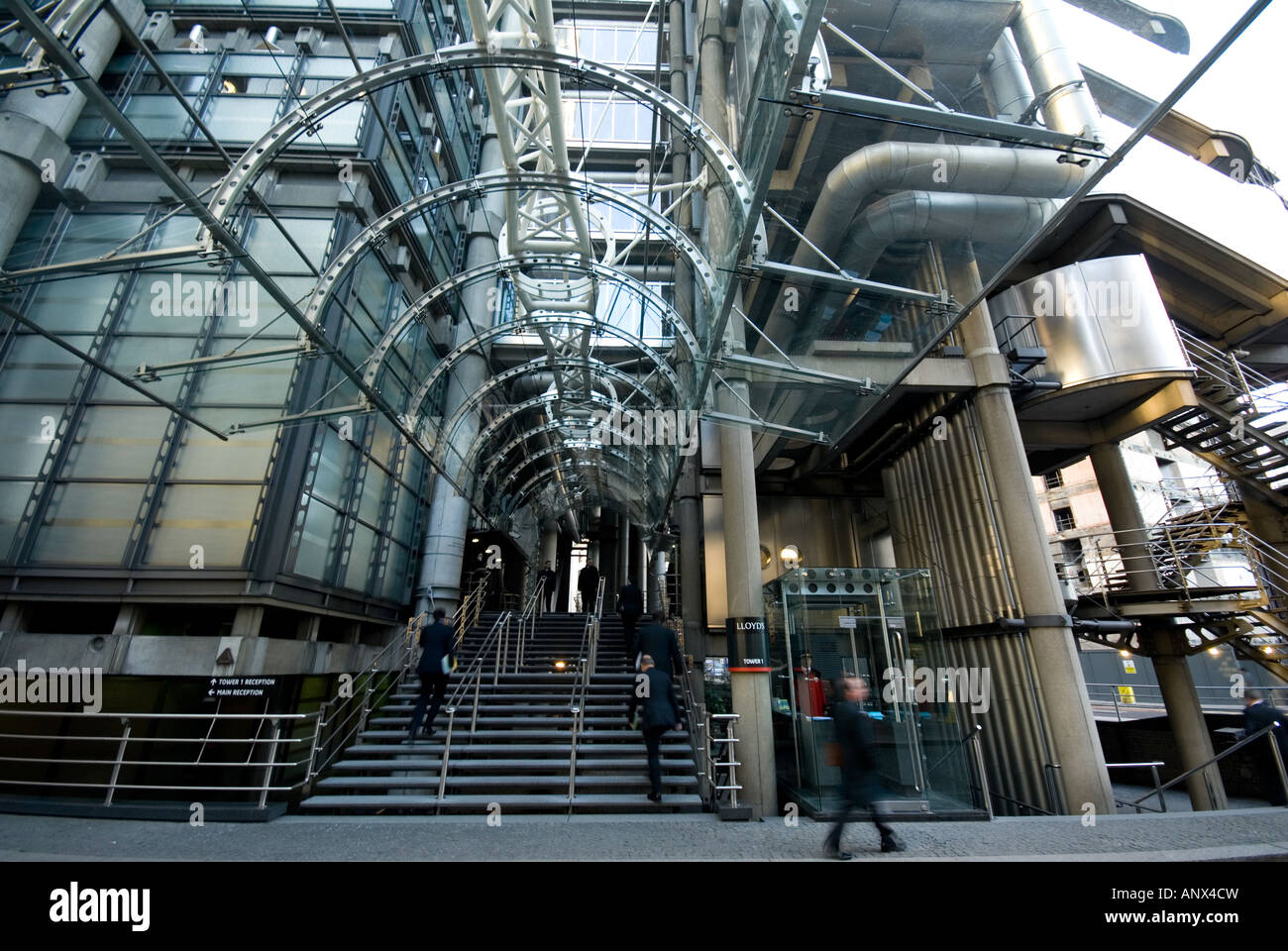 Lloyd's of London entrance Businessman walking London Stock Photo - Alamy