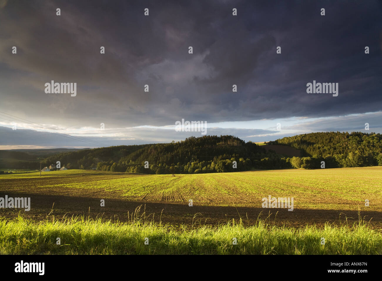 cultural landscape in morning light at stormy atmosphere, Germany ...