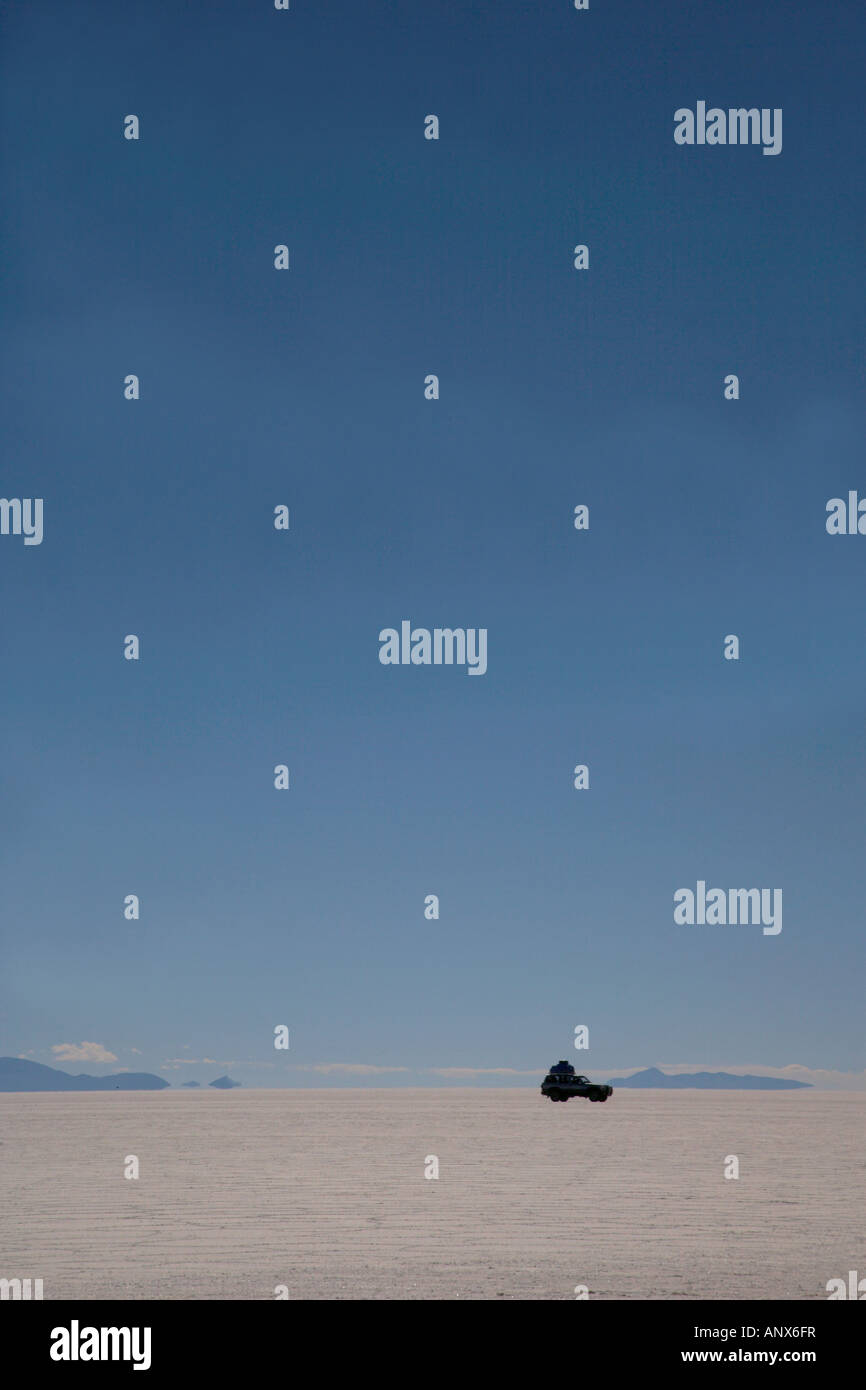 Car driving across salt flats hi-res stock photography and images - Alamy