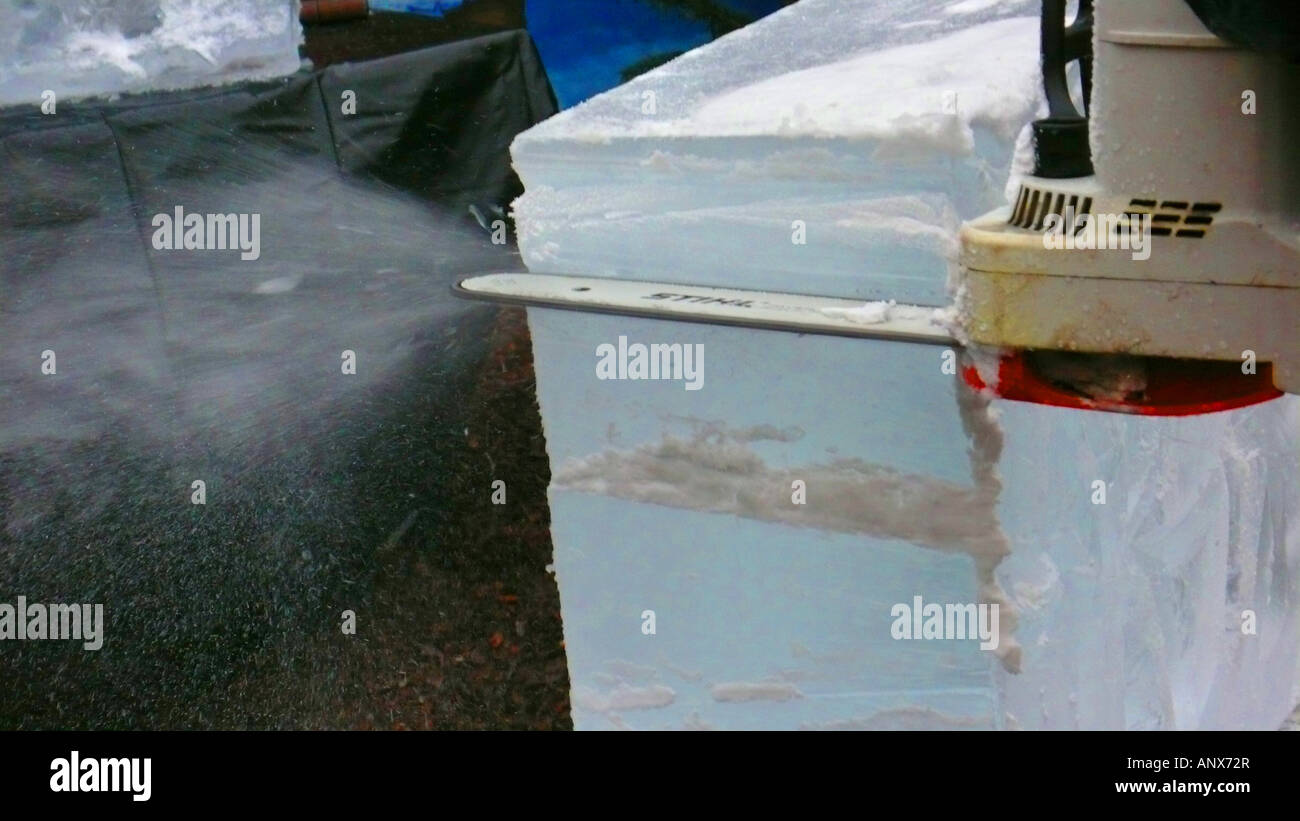 chain saw cutting an ice block Stock Photo - Alamy