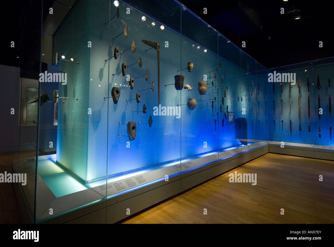 old objects behind a glass, blue light museum of london Stock Photo - Alamy
