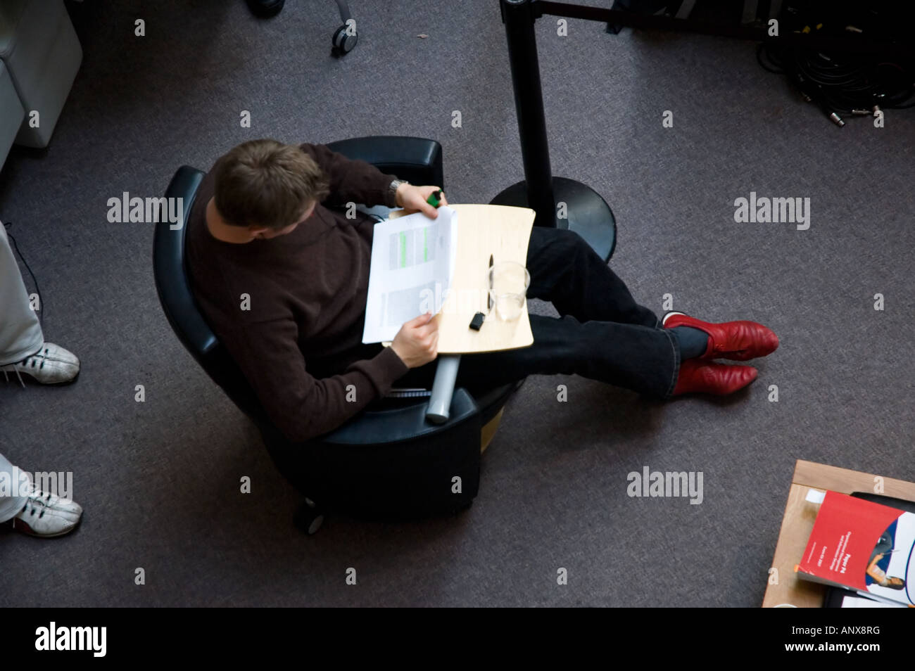 British Library man reading seat in an armchair , picture from above ...