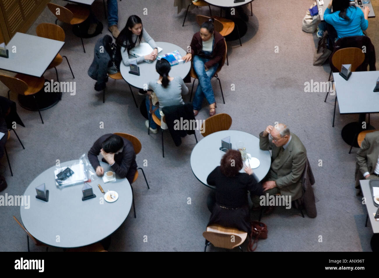 British Library people drink a coffee in a restaurant from above London ...