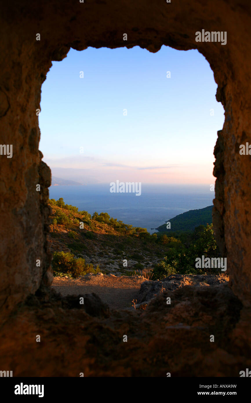Sunset through ancient stone arch over Turkish landscape Stock Photo ...