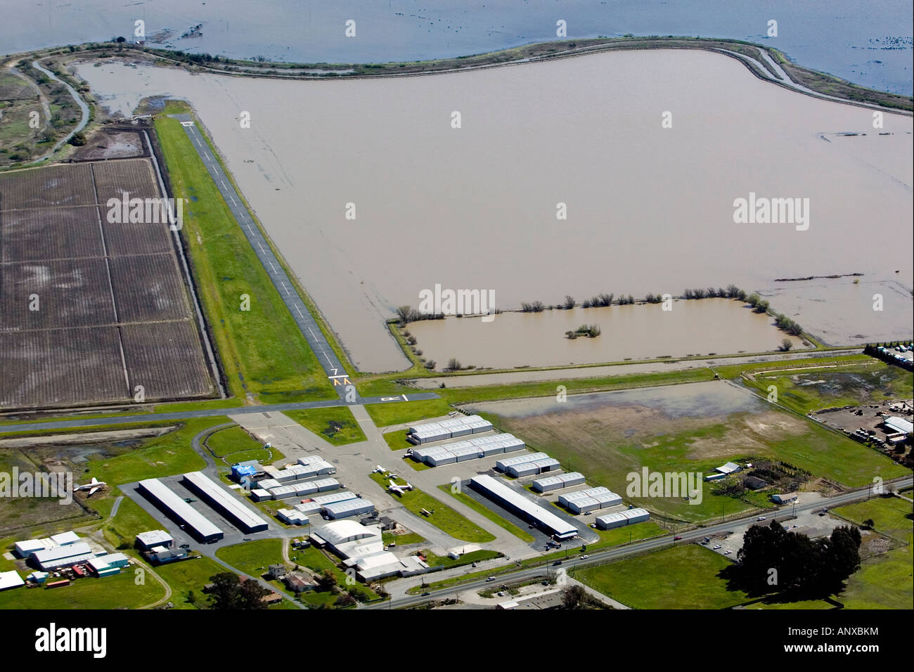 aerial view above levy holding back flooding Shellville airport Sonoma ...