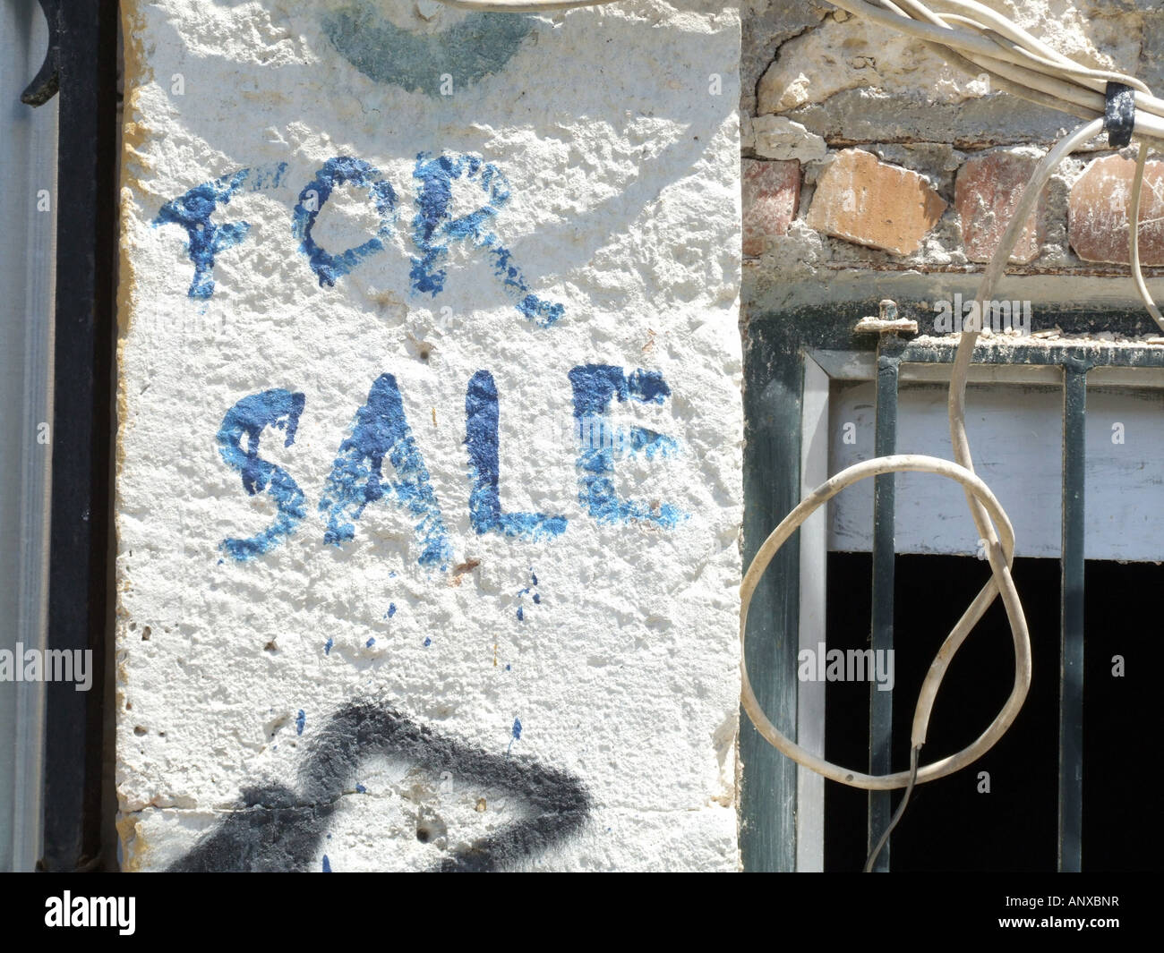 for sale sign outside property in greece athens Stock Photo - Alamy