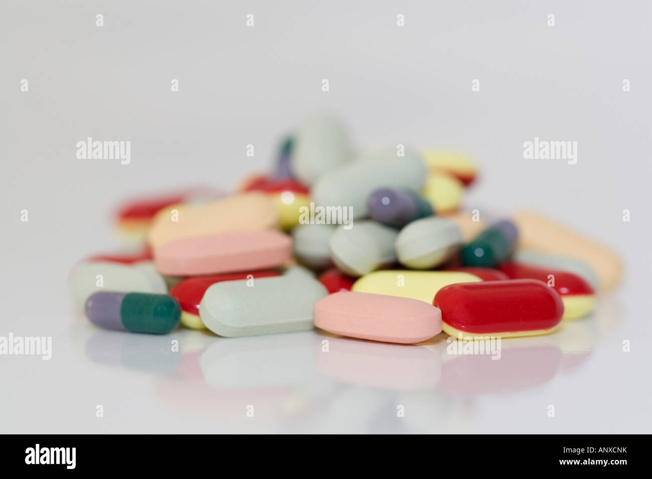Assorted pills and medication on white background Stock Photo - Alamy