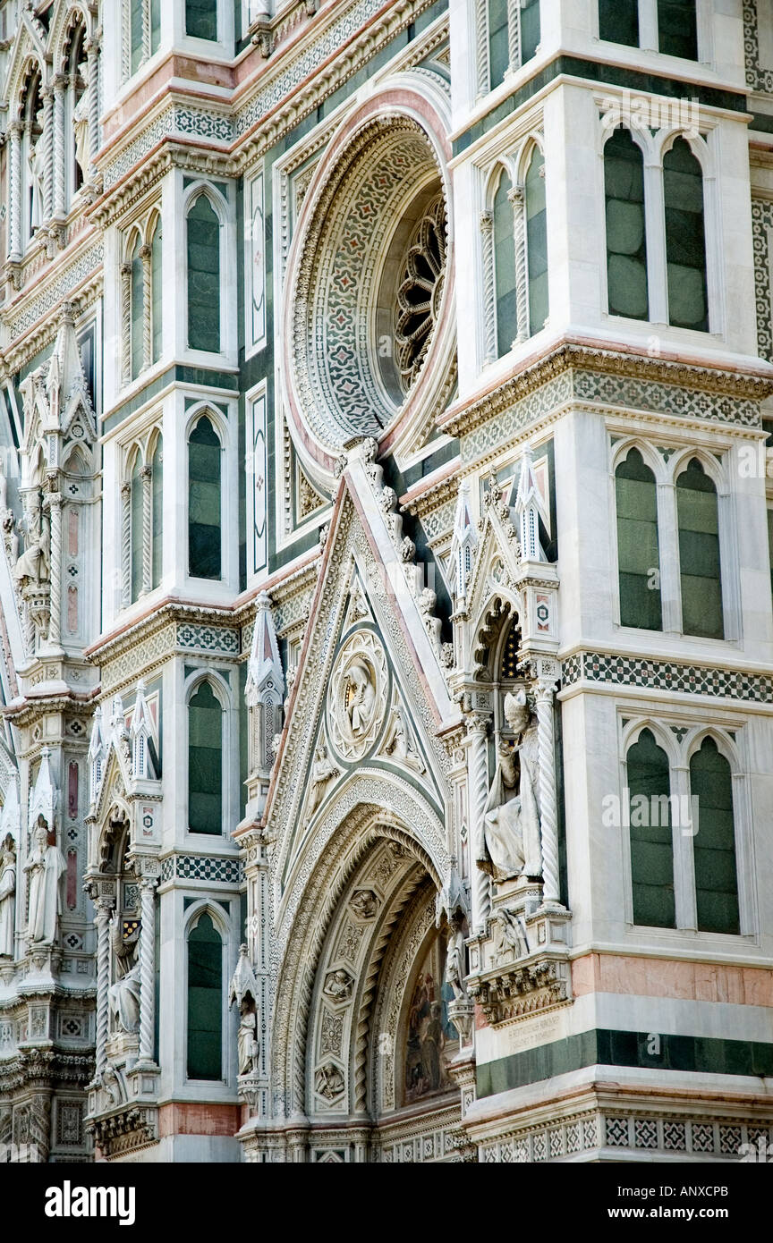A vertical picture of part of the front of the Cathedral in Florence ...