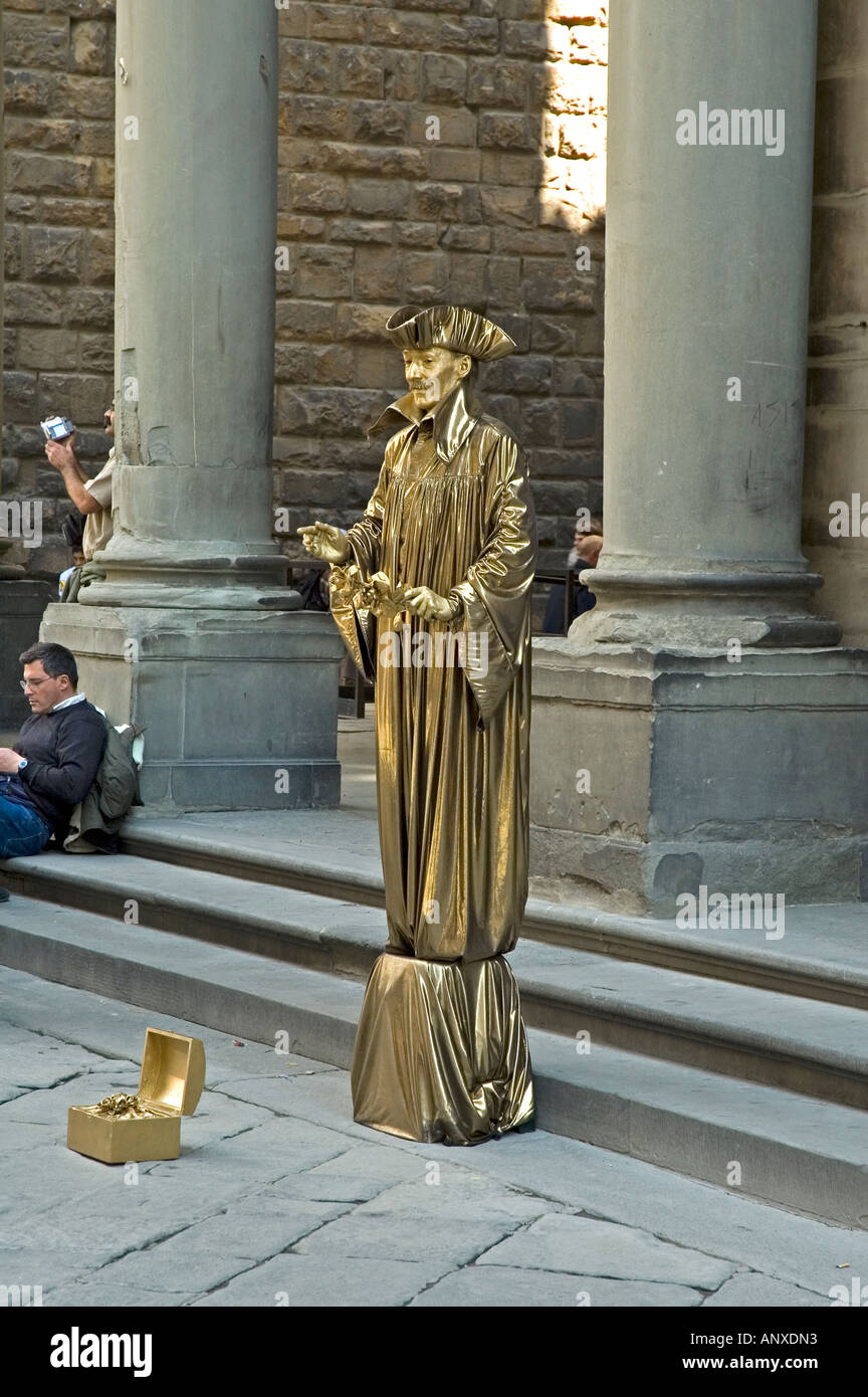 A vertical picture of a living statue in the Uffizi Courtyard Stock ...