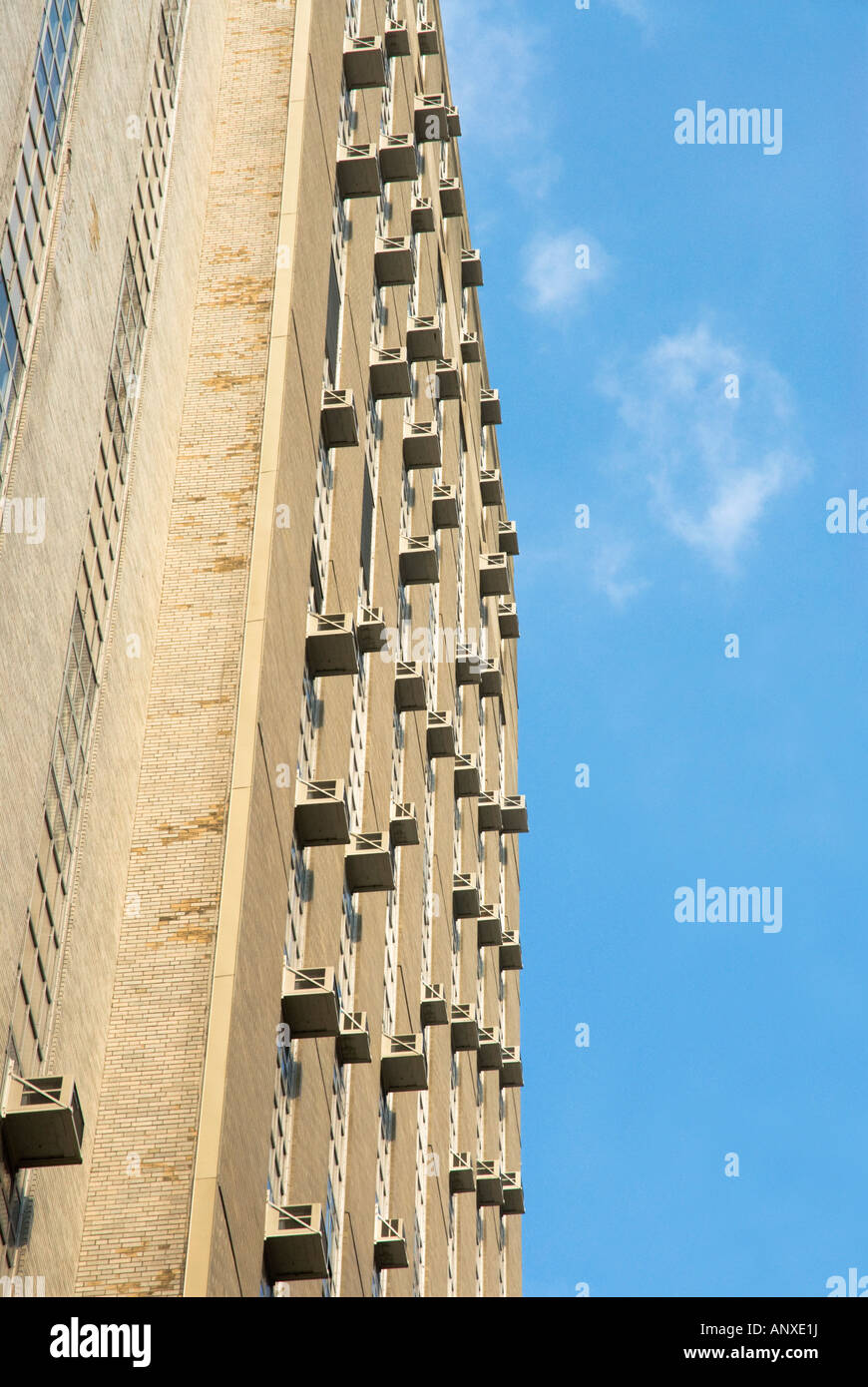 Air conditioning units attached to individual units of an office ...