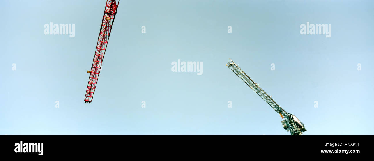 Two construction cranes Stock Photo - Alamy
