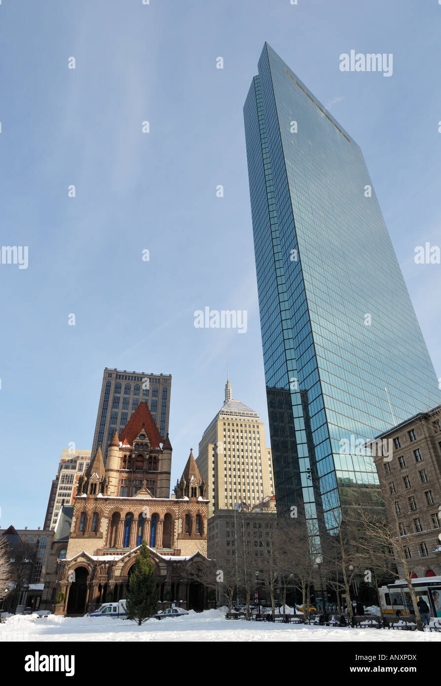 Trinity Church and the tall John Hancock Tower on Copley Square, Boston ...