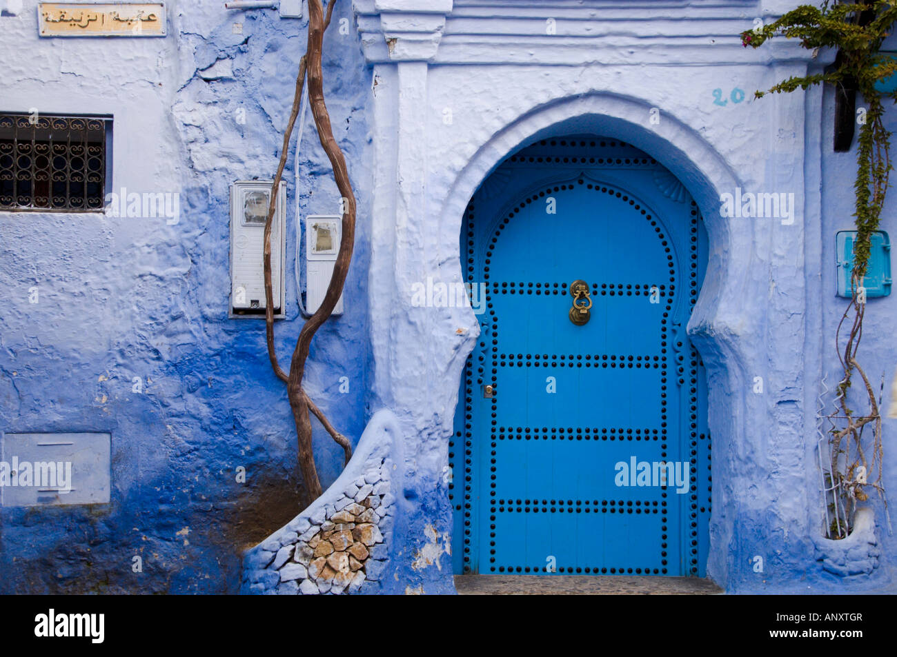 Blue Door and house in Chefchaouen Stock Photo - Alamy