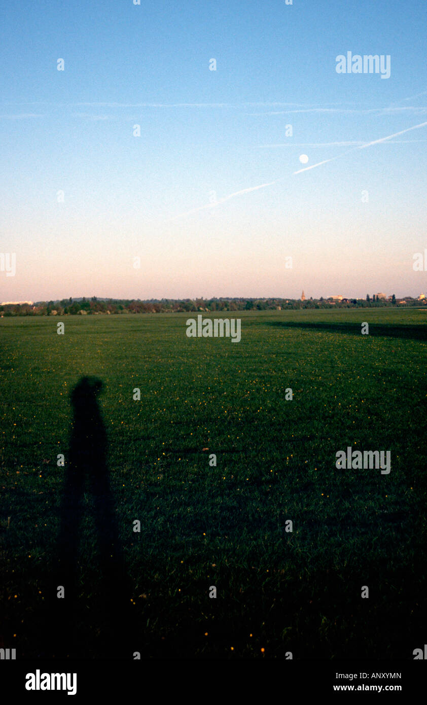 Shadow and moon at dusk, Port Meadow, Oxford, UK Stock Photo - Alamy