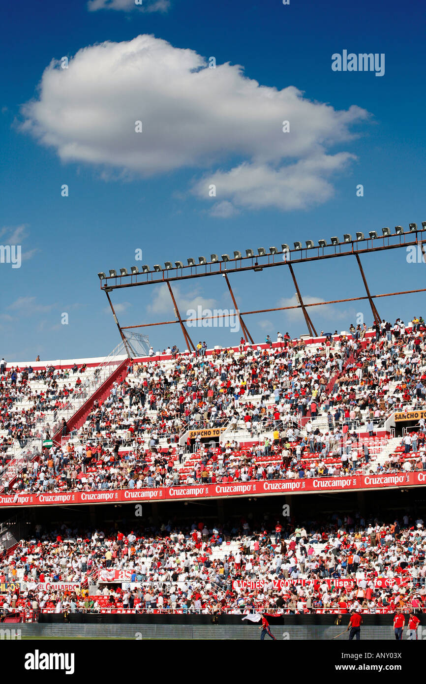 Crowded stands and a white cloud Stock Photo - Alamy