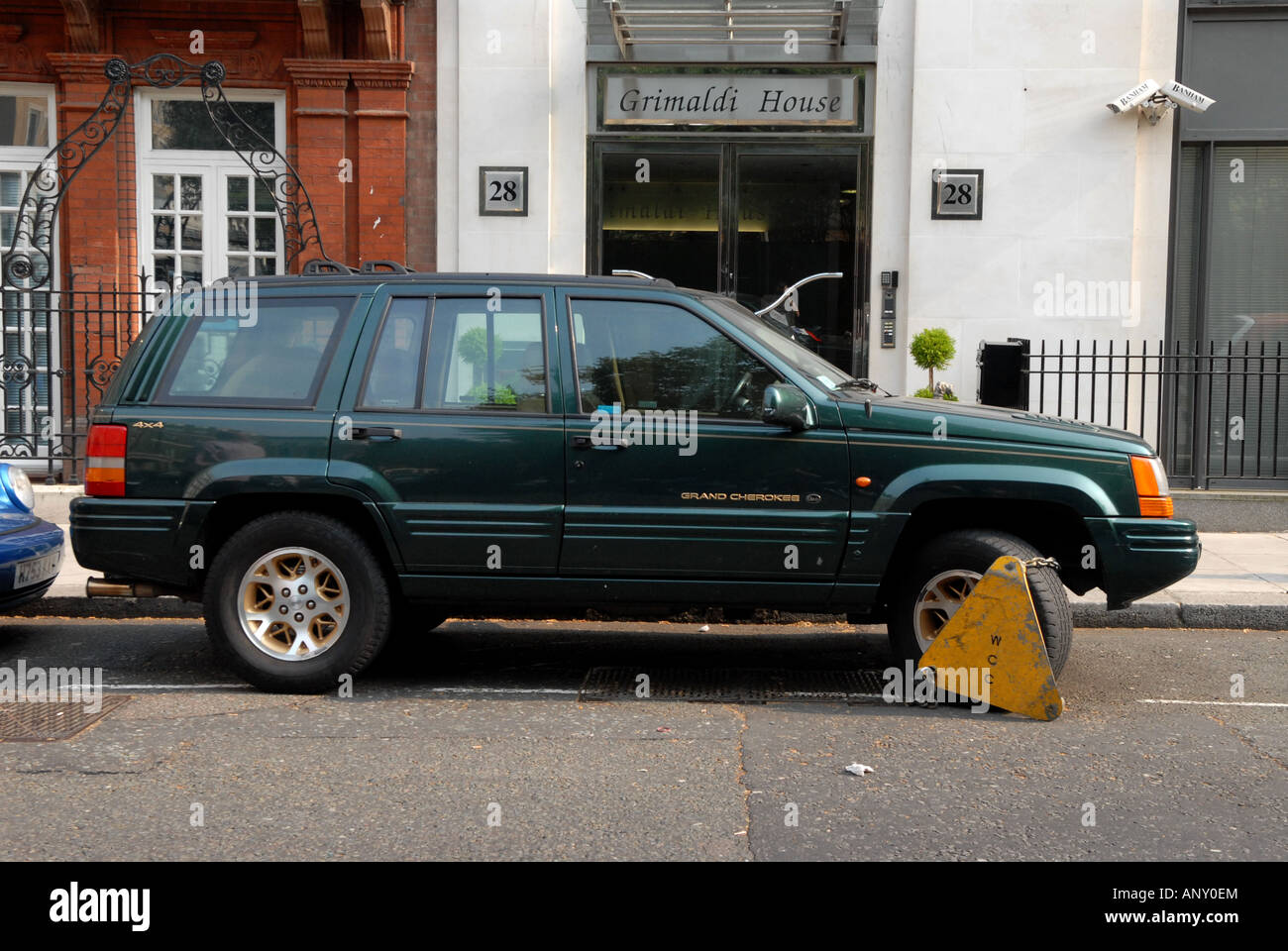 A Jeep Grand Cherokee clamped London England 28 04 2007 Stock Photo - Alamy