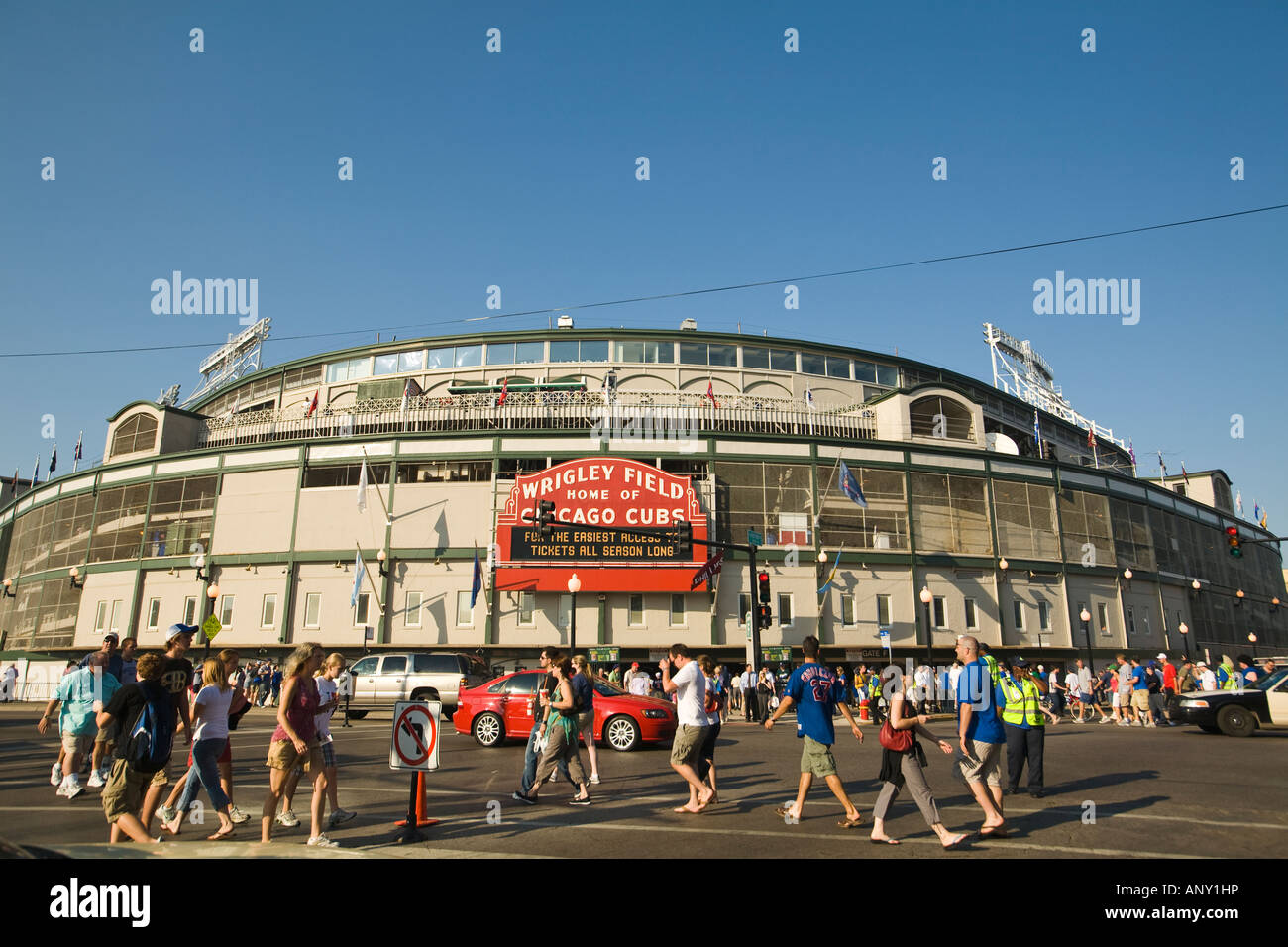 ILLINOIS Chicago Crowds cross street outside Wrigley Field on game day ...