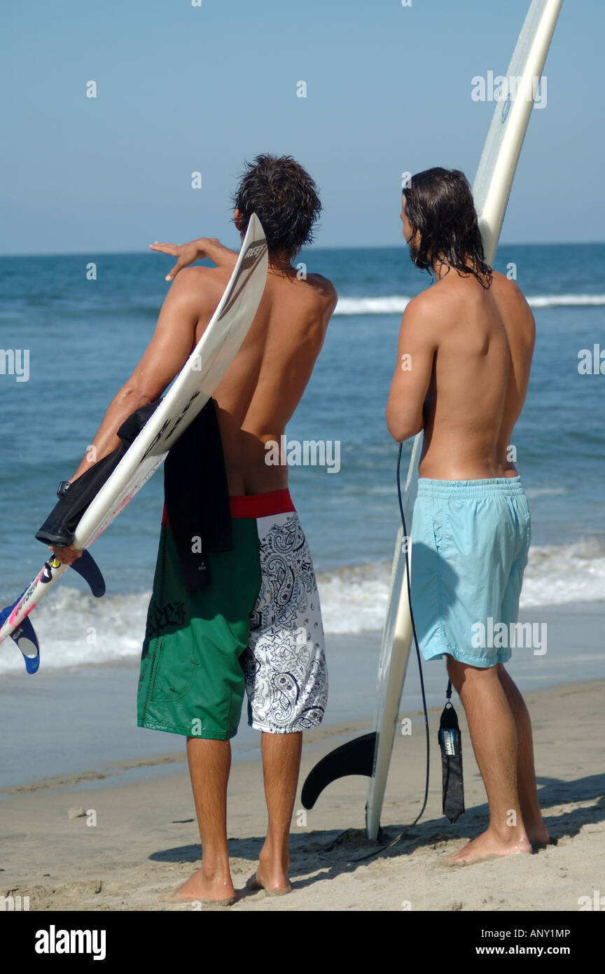 Two guys surfing surfboards Mexico ocean Stock Photo - Alamy