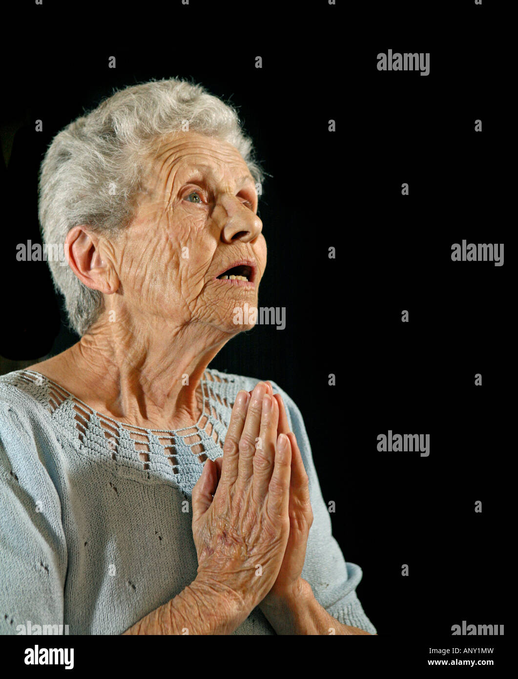 Senior Citizen Praying to the Lord Stock Photo - Alamy