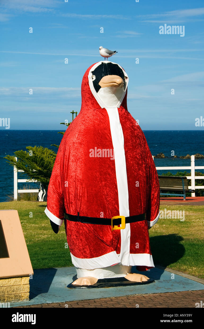 Australia, Tasmania, Penguin Town. Giant penguin dressed as Santa Claus ...