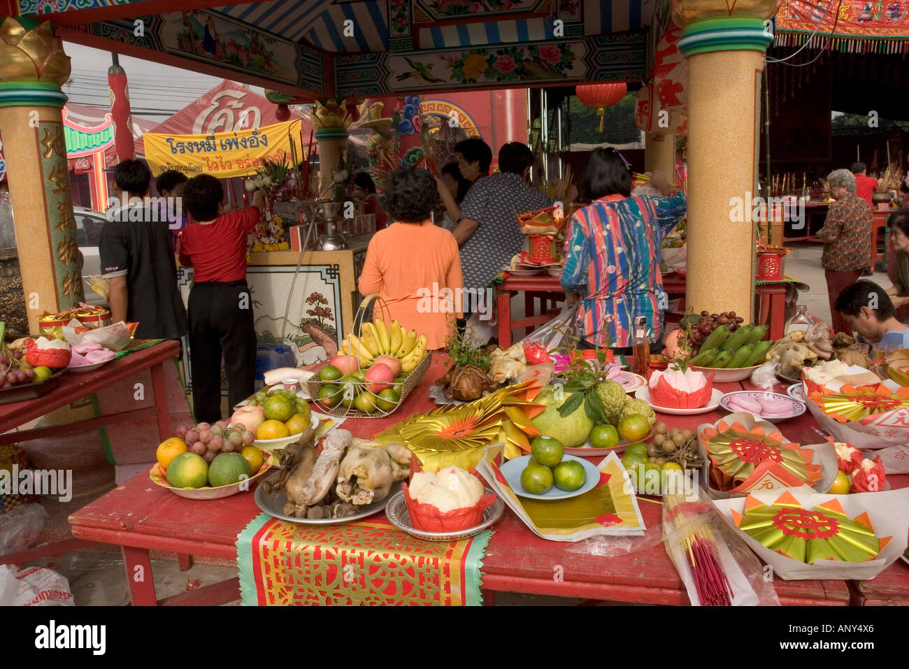 Thailand, Food Offerings to the gods at Chinese Buddhist temple Stock ...