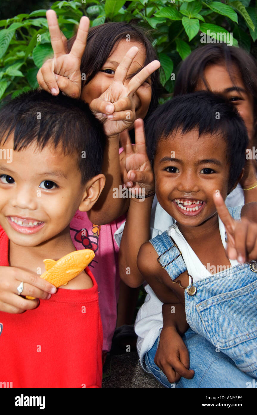 Philippines, Luzon, Manila. Children having fun in Rizal Park Stock ...