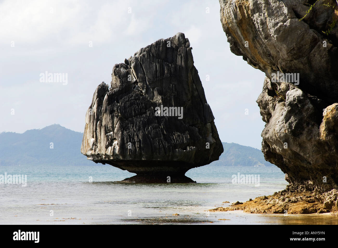 Philippines, Palawan Province, El Nido Town, Bacuit Bay. Unusual limestone rock formations near ...