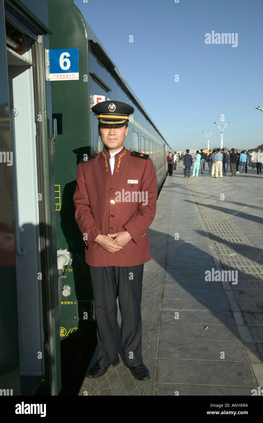 Steward welcomes passengers on board the Tangula Express / Sky Train ...