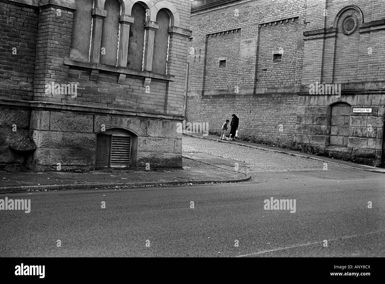 A person and child walking through Manningham Mill, Bradford, Yorkshire ...