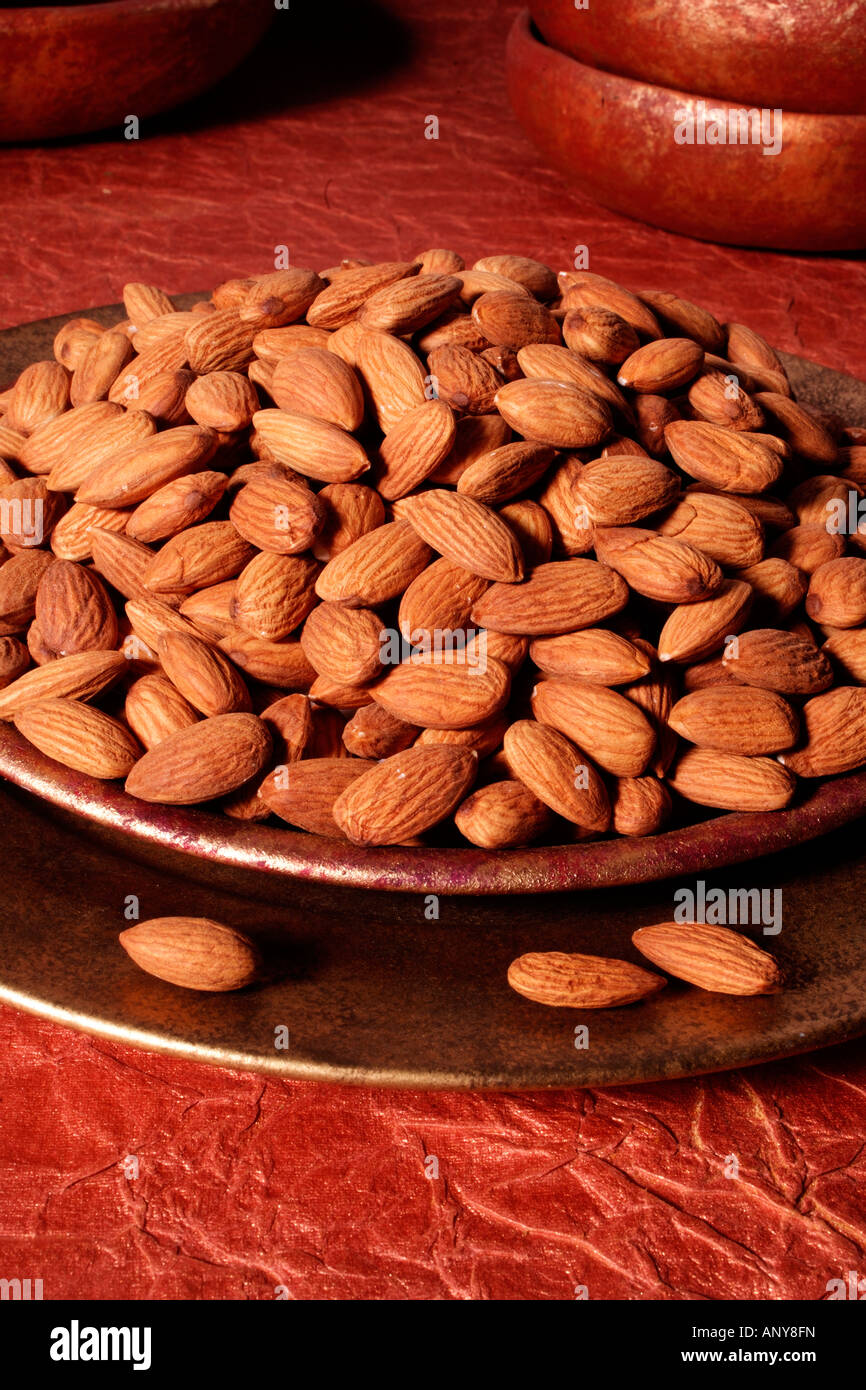 BOWL OF WHOLE ALMONDS Stock Photo - Alamy