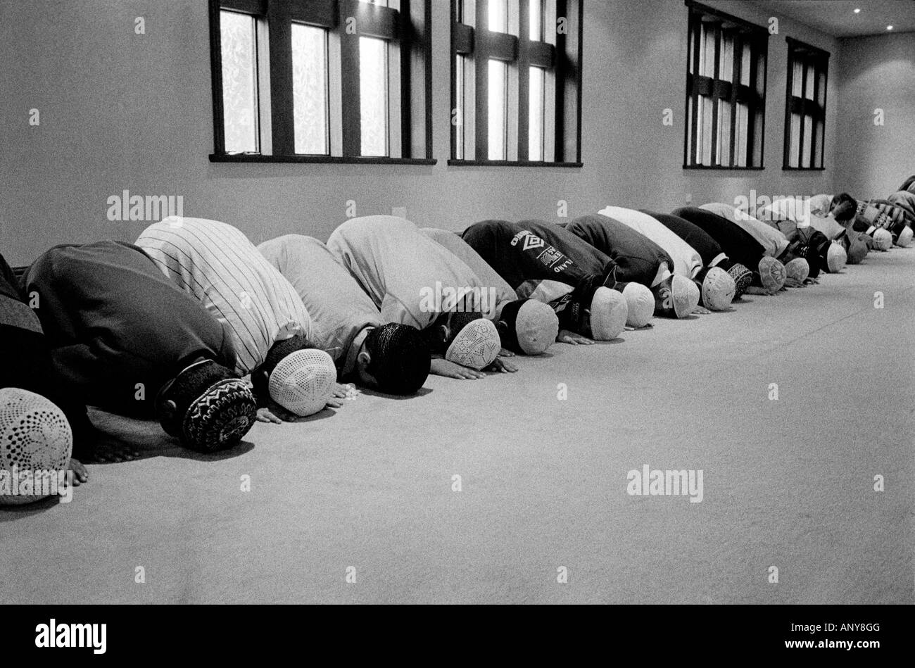 Children praying at the Victor Street Mosque, Manningham, Bradford ...