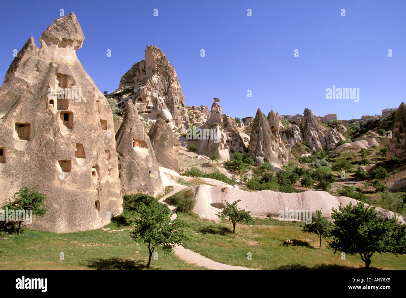 Europe, Middle East, Turkey, Cappadocia, Uchisar. Cone Tufa Buildings ...