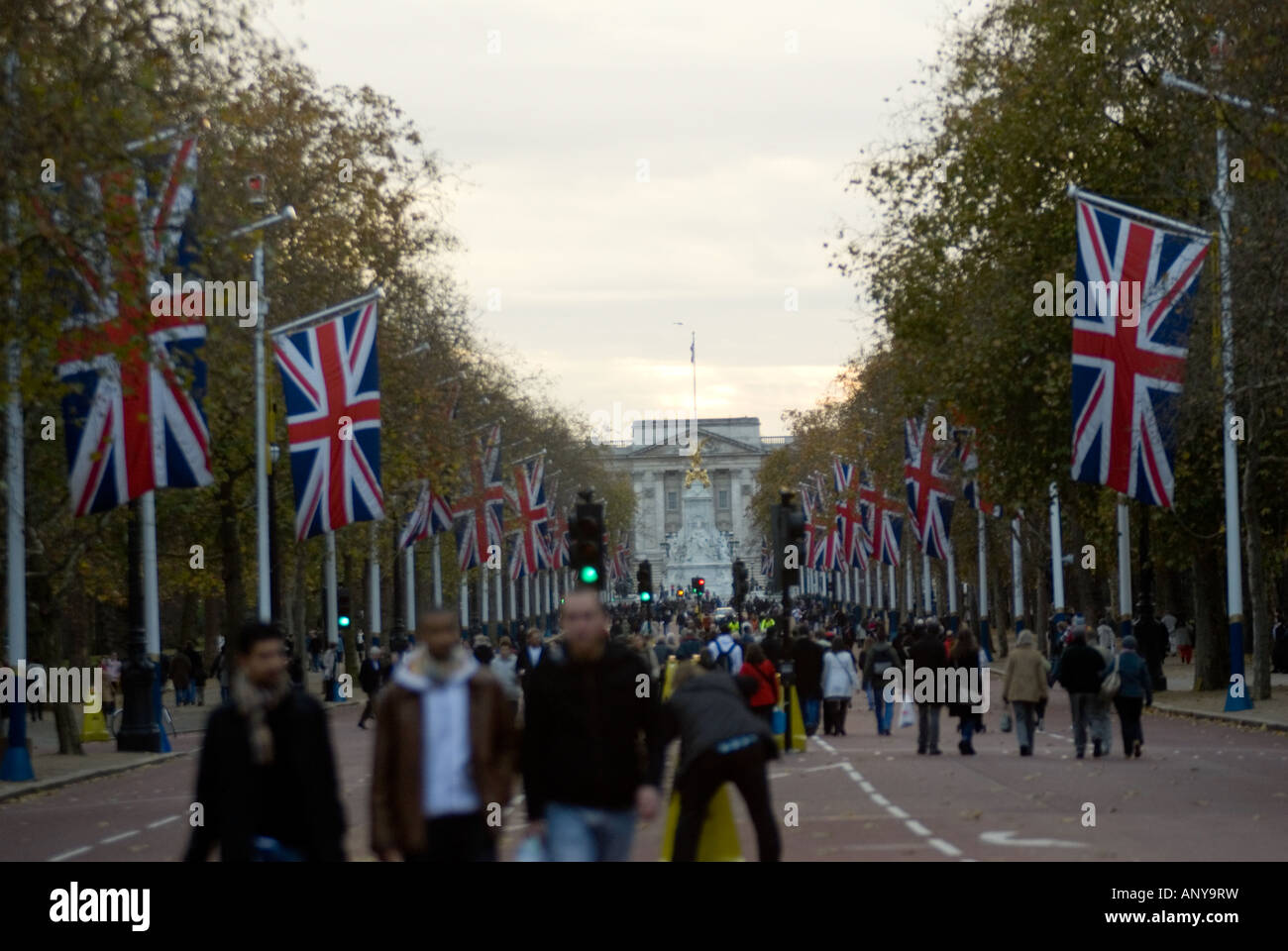 Buckingham Palace Heraldry Royal british flags in line with people ...