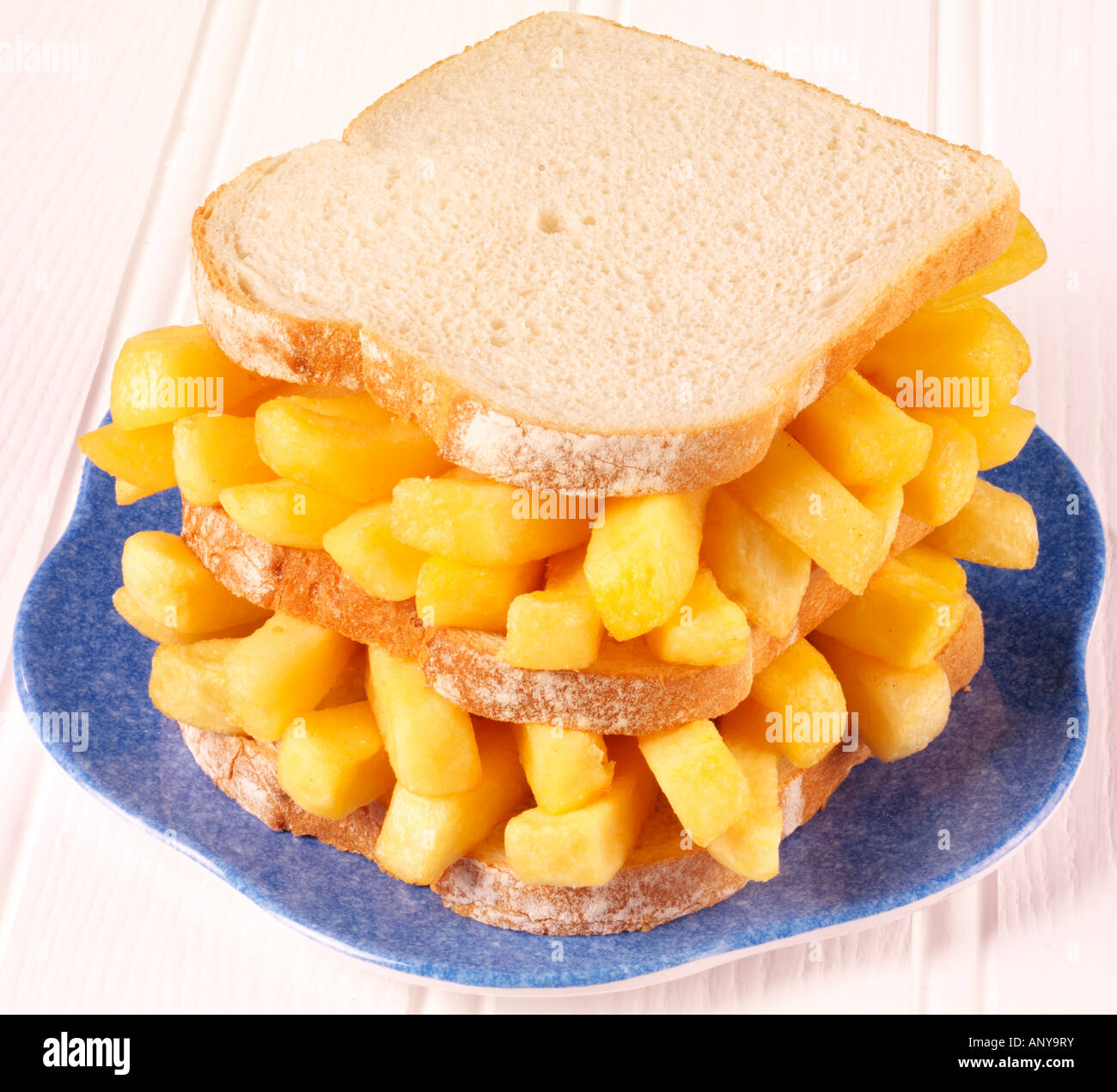 CHIP BUTTY ON BLUE PLATE Stock Photo - Alamy