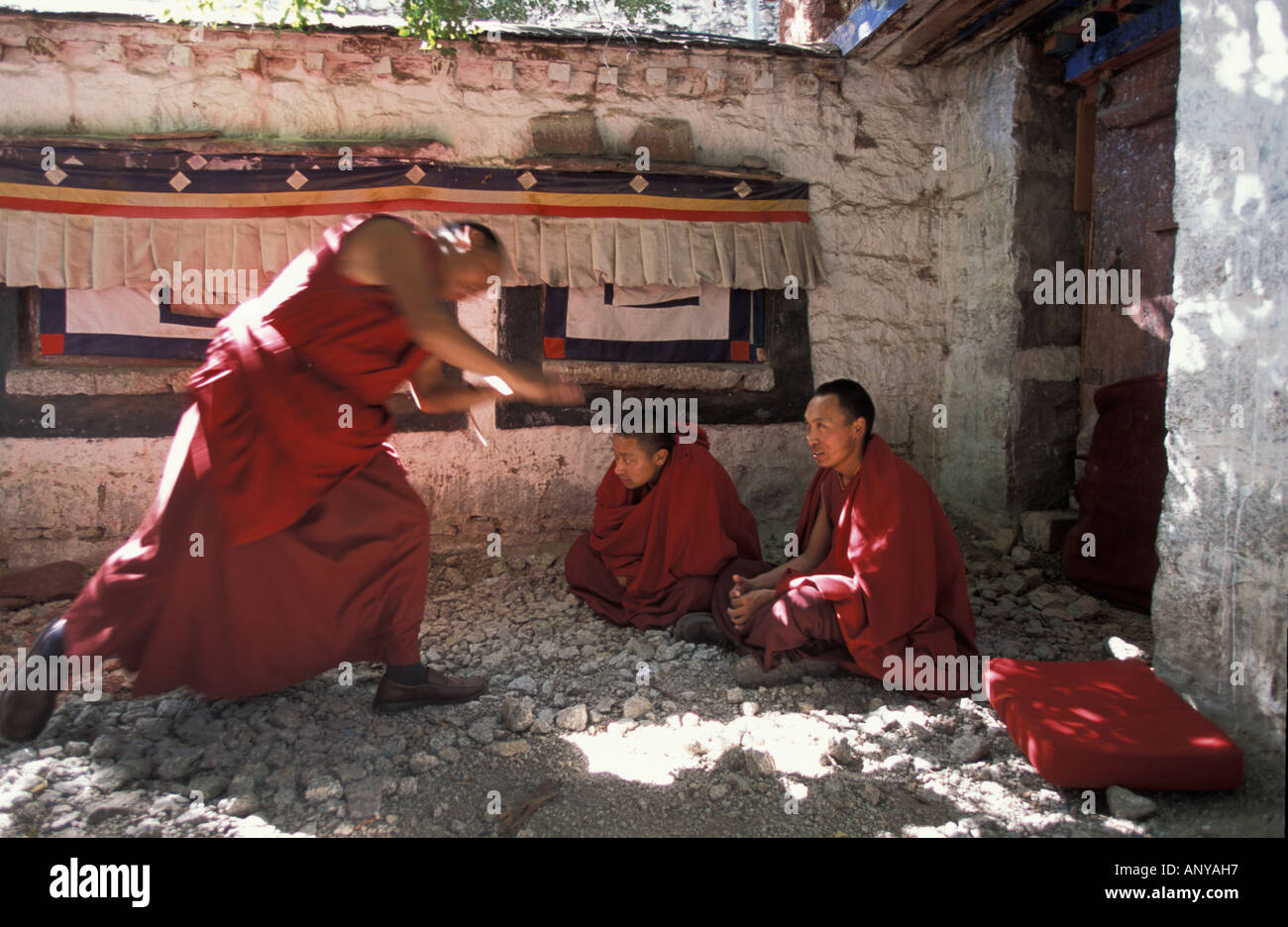 Tibet, Lhasa, Monks debating at Sera Monastery Stock Photo - Alamy