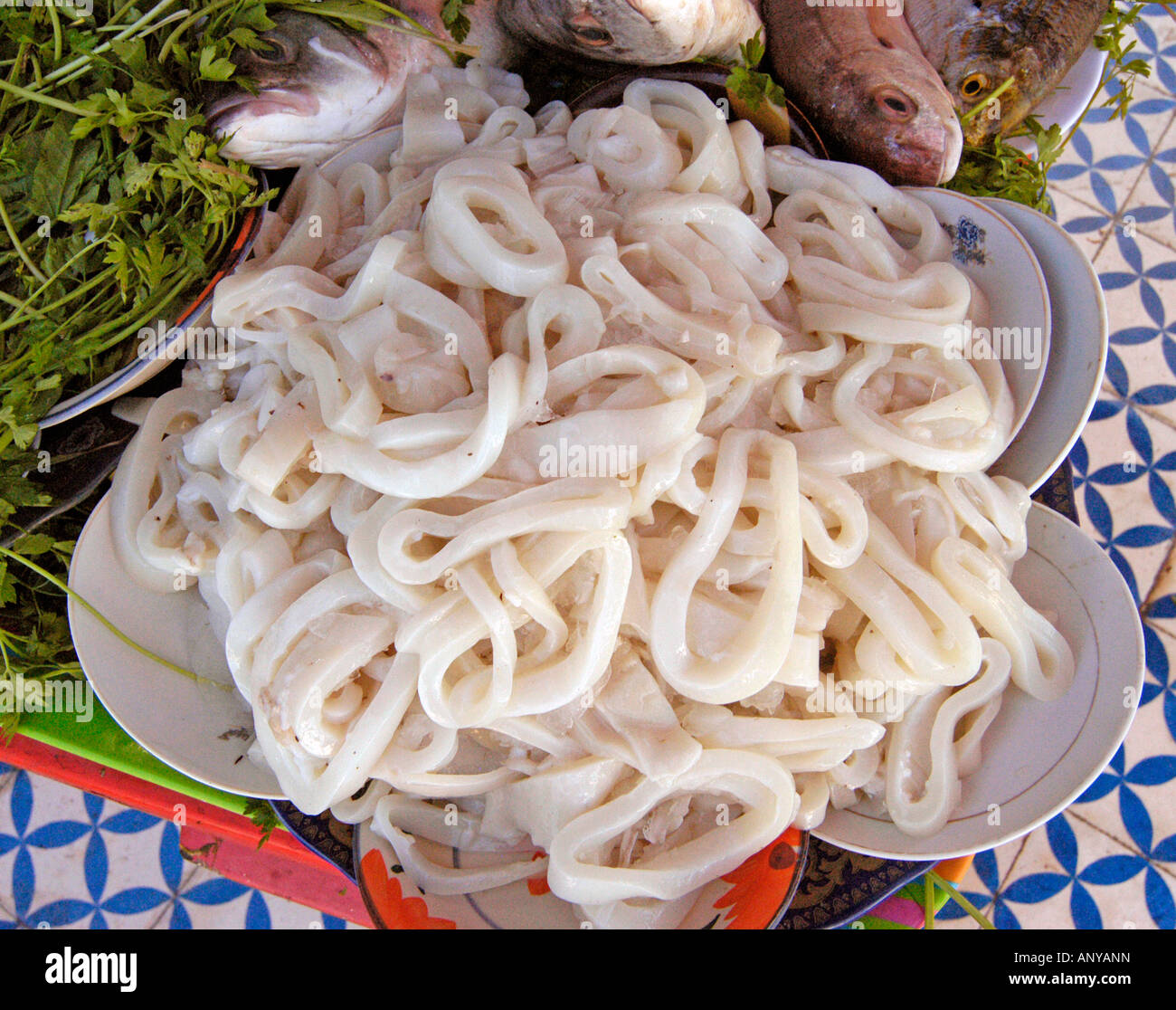 Uncooked calamari rings hi-res stock photography and images - Alamy