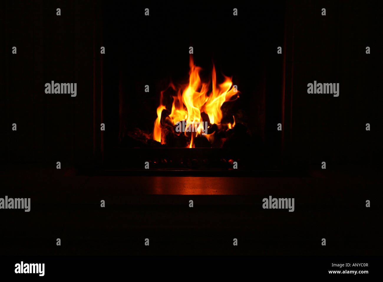 the warmth of the hearth fire Stock Photo - Alamy