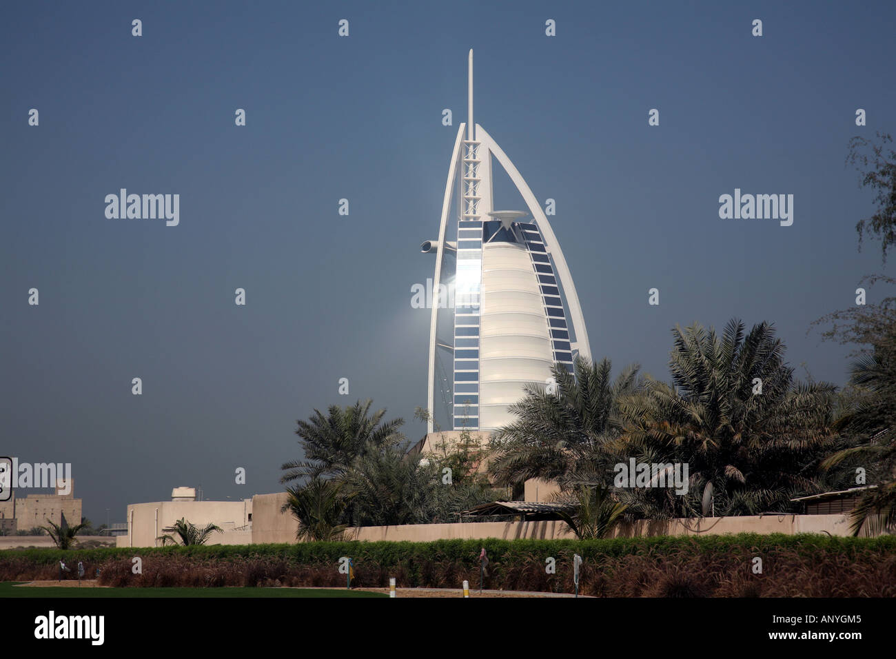 Sunlight glints off the Burj hotel, Dubai, UAE Stock Photo - Alamy