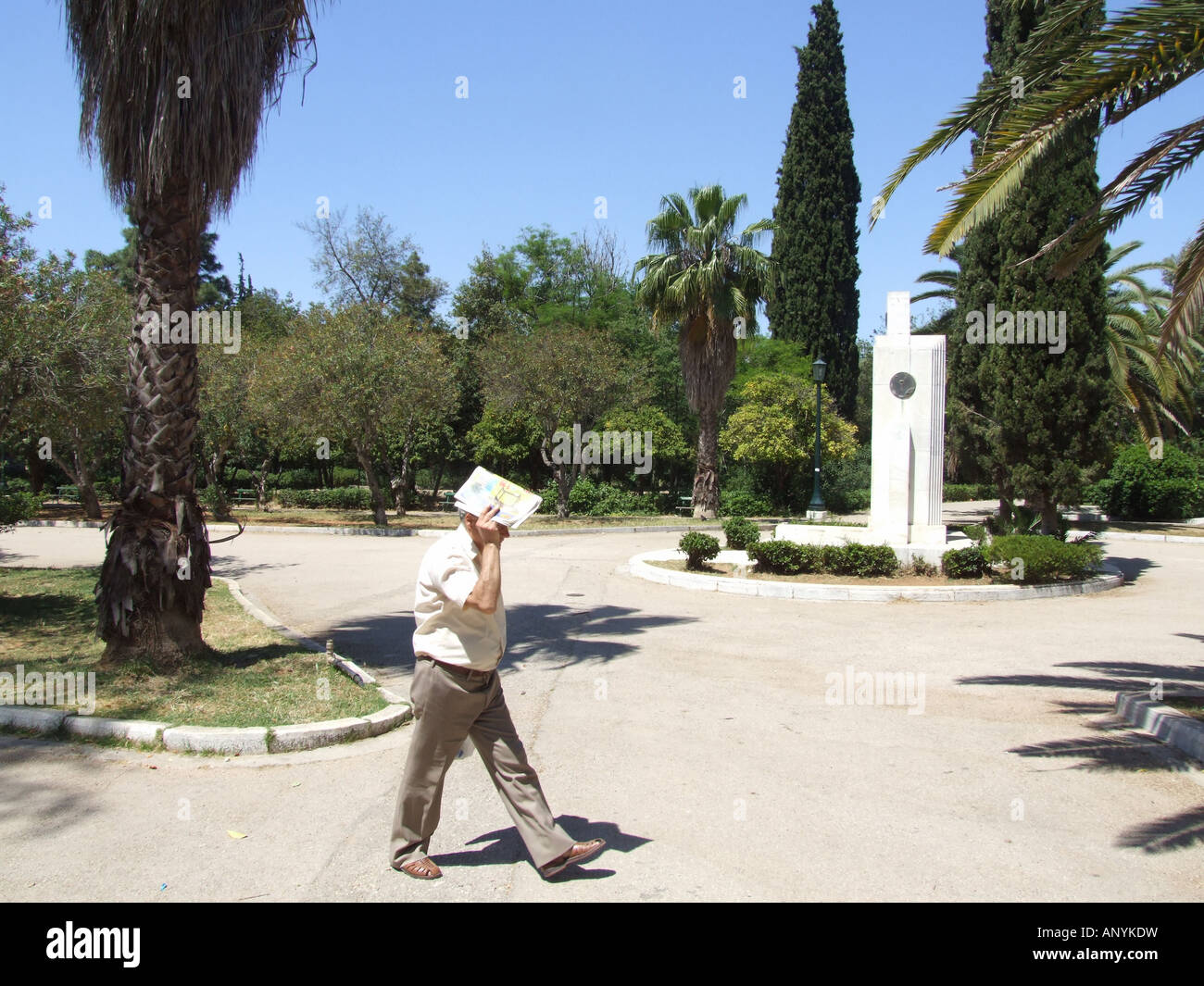 man walking in park in athens greece Stock Photo - Alamy