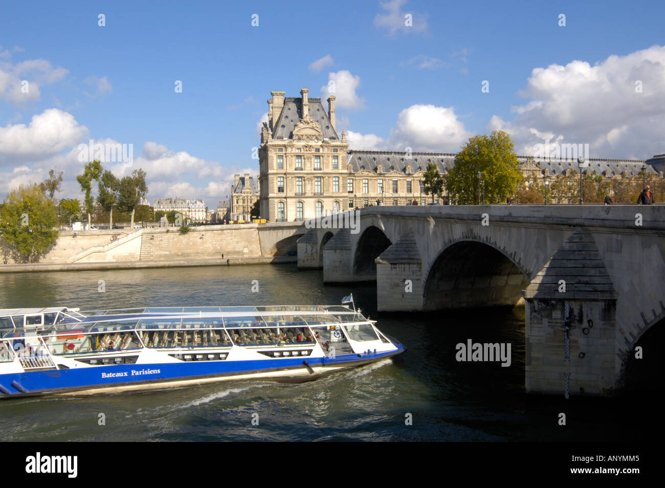 France, Paris, sightseeing river cruise in front of Louvre Museum Stock ...