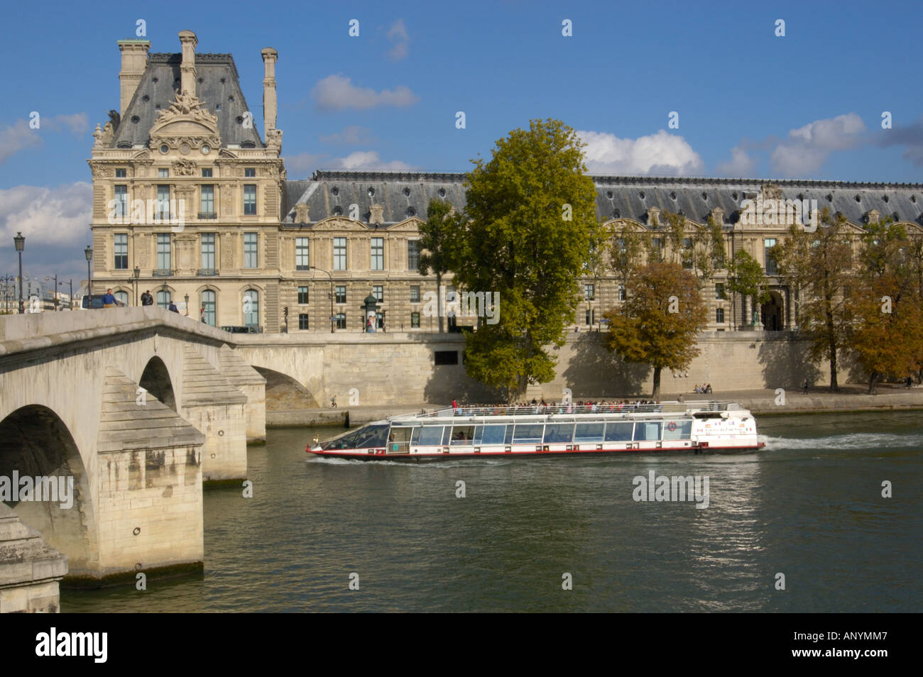 France, Paris, sightseeing river cruise in front of Louvre Museum Stock ...