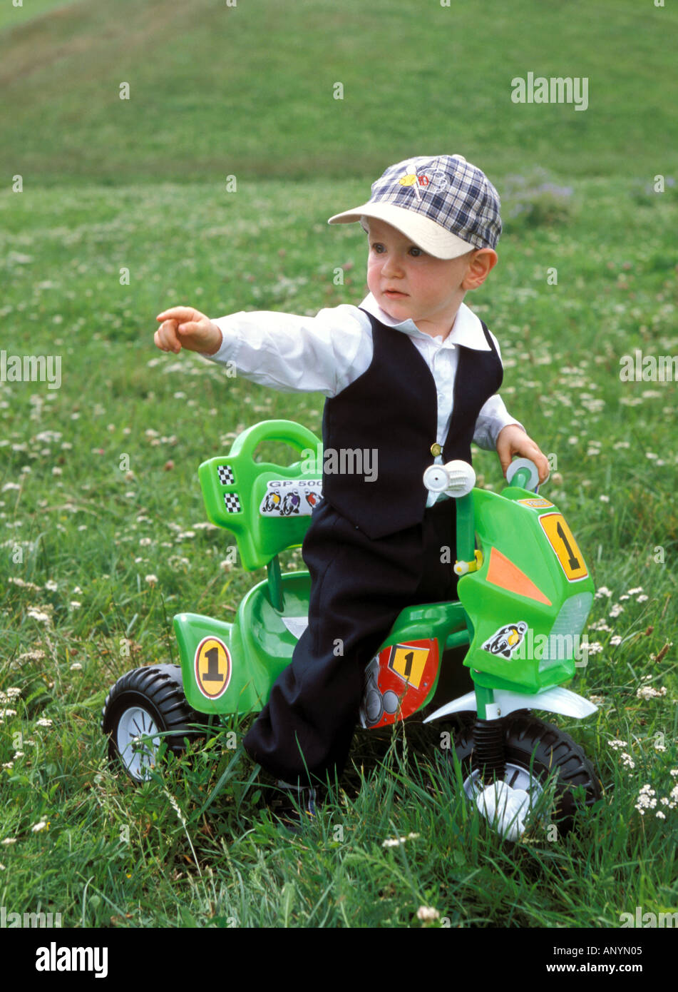 baby boy riding toybike MR8423 Stock Photo - Alamy