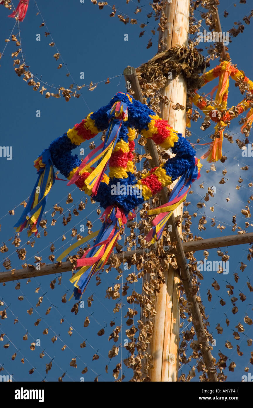 Midsummer festival pole in Mariehamn with a garland showing the Åland ...