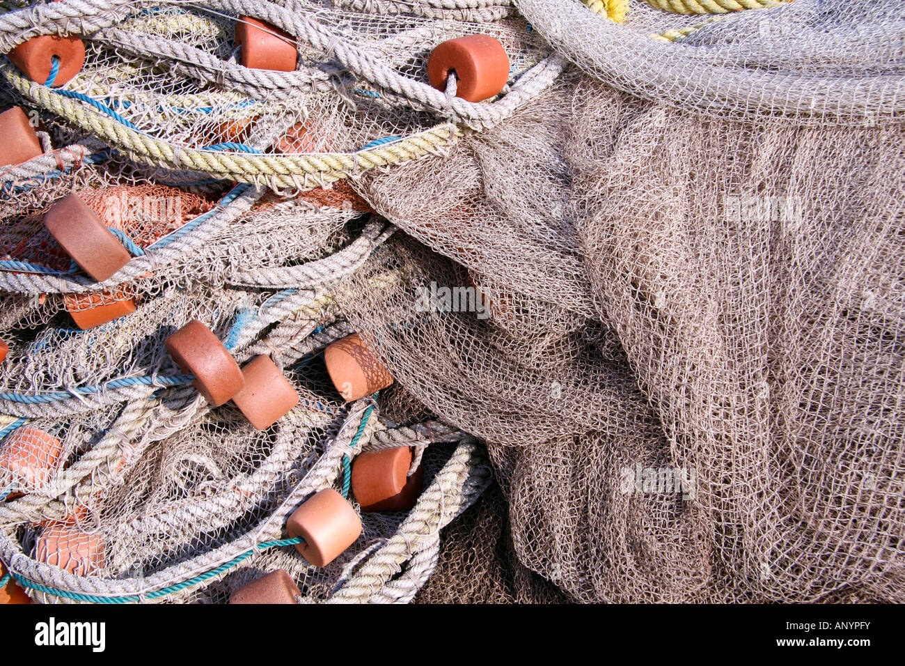fishing nets and floaters at the port Stock Photo - Alamy